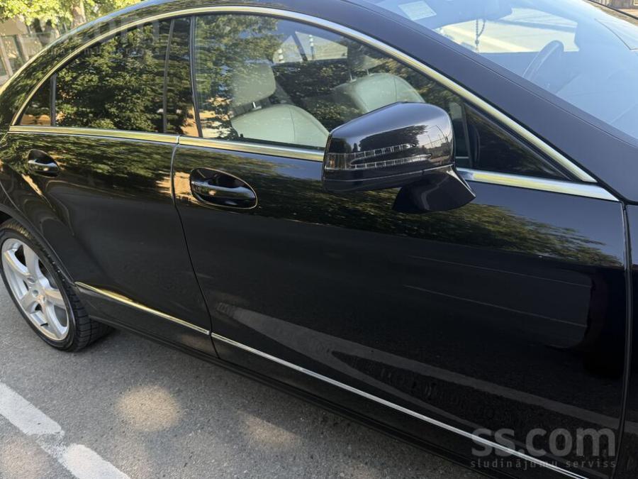 Black Mercedes-Benz CLS 350 2011 in Riga, with an engine capacity of 3.00 L and mileage of 263 thousand km for 12100 €, photo 4 on AUTOMOTO.COM.LV
