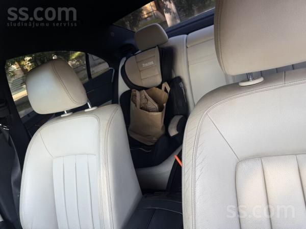 Black Mercedes-Benz CLS 350 2011 in Riga, with an engine capacity of 3.00 L and mileage of 263 thousand km for 12100 €, photo 10 on AUTOMOTO.COM.LV