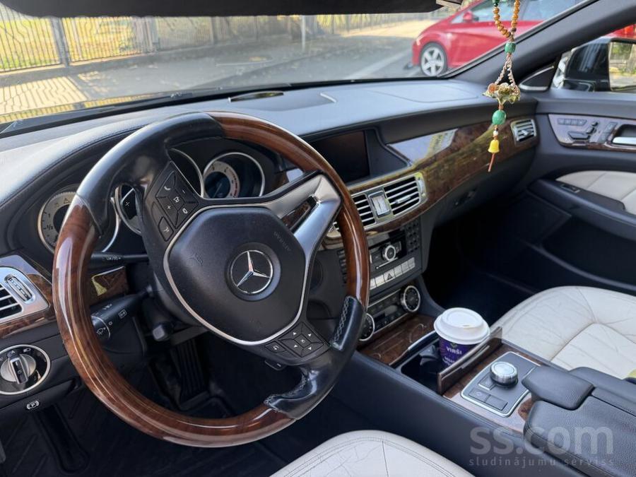 Black Mercedes-Benz CLS 350 2011 in Riga, with an engine capacity of 3.00 L and mileage of 263 thousand km for 12100 €, photo 12 on AUTOMOTO.COM.LV