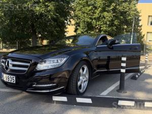 Black Mercedes-Benz CLS 350 2011 in Riga, with an engine capacity of 3.00 L and mileage of 263 thousand km for 12100 €, photo 14 on AUTOMOTO.COM.LV