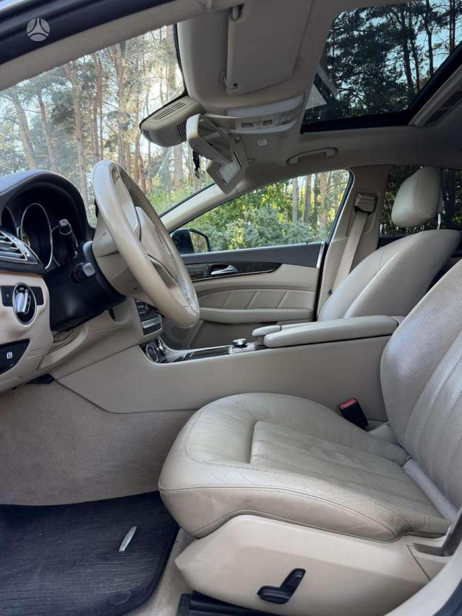 Black Mercedes-Benz CLS 350 2011 in Kaunas, with an engine capacity of 3.00 L and mileage of 290 thousand km for 11400 €, photo 18 on AUTOMOTO.COM.LV