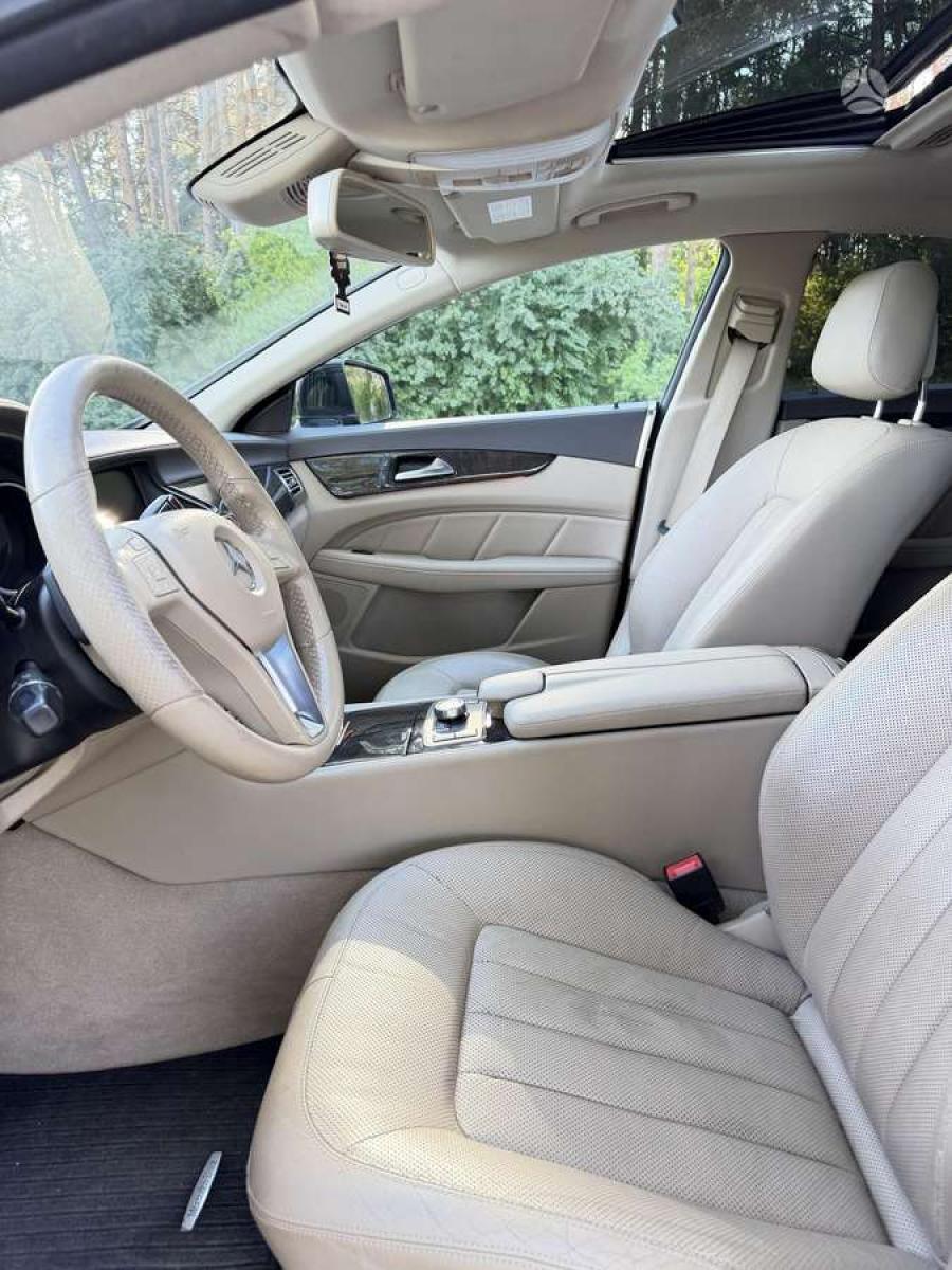 Black Mercedes-Benz CLS 350 2011 in Kaunas, with an engine capacity of 3.00 L and mileage of 290 thousand km for 11400 €, photo 23 on AUTOMOTO.COM.LV