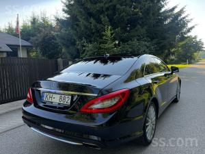 Black Mercedes-Benz CLS 350 2012 in Riga, with an engine capacity of 3.00 L and mileage of 278 thousand km for 10900 €, photo 9 on AUTOMOTO.COM.LV