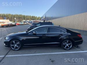 Black Mercedes-Benz CLS 350 2012 in Riga, with an engine capacity of 3.00 L and mileage of 190 thousand km for 10500 €, photo 6 on AUTOMOTO.COM.LV