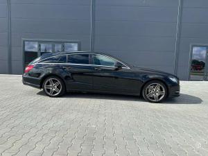 Black Mercedes-Benz CLS 350 2012 in Klaipeda, with an engine capacity of 2.99 L and mileage of 258 thousand km for 11800 €, photo 15 on AUTOMOTO.COM.LV