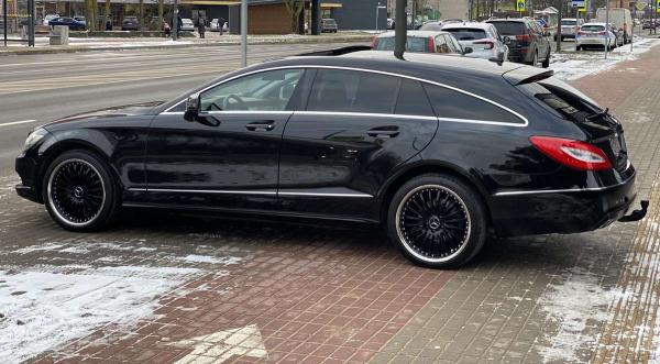 Black Mercedes-Benz CLS 350 2013 in Marijampole, with an engine capacity of 2.99 L and mileage of 330 thousand km for 12750 €, photo 10 on AUTOMOTO.COM.LV