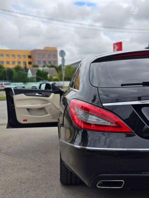 Black Mercedes-Benz CLS 350 2013 in Siauliai, with an engine capacity of 2.99 L and mileage of 232 thousand km for 12950 €, photo 13 on AUTOMOTO.COM.LV