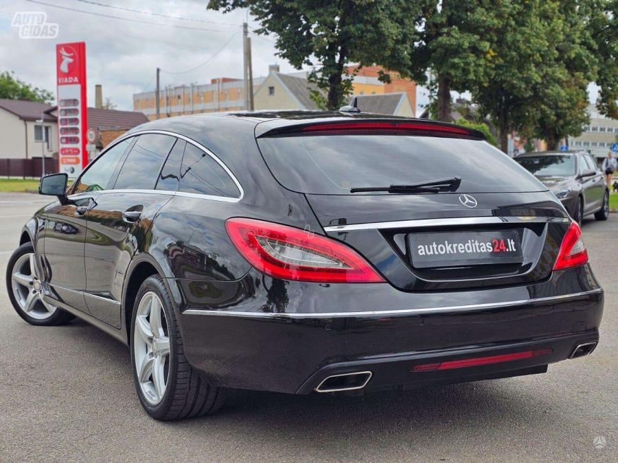 Black Mercedes-Benz CLS 350 2013 in Siauliai, with an engine capacity of 3.00 L and mileage of 232 thousand km for 11950 €, photo 13 on AUTOMOTO.COM.LV