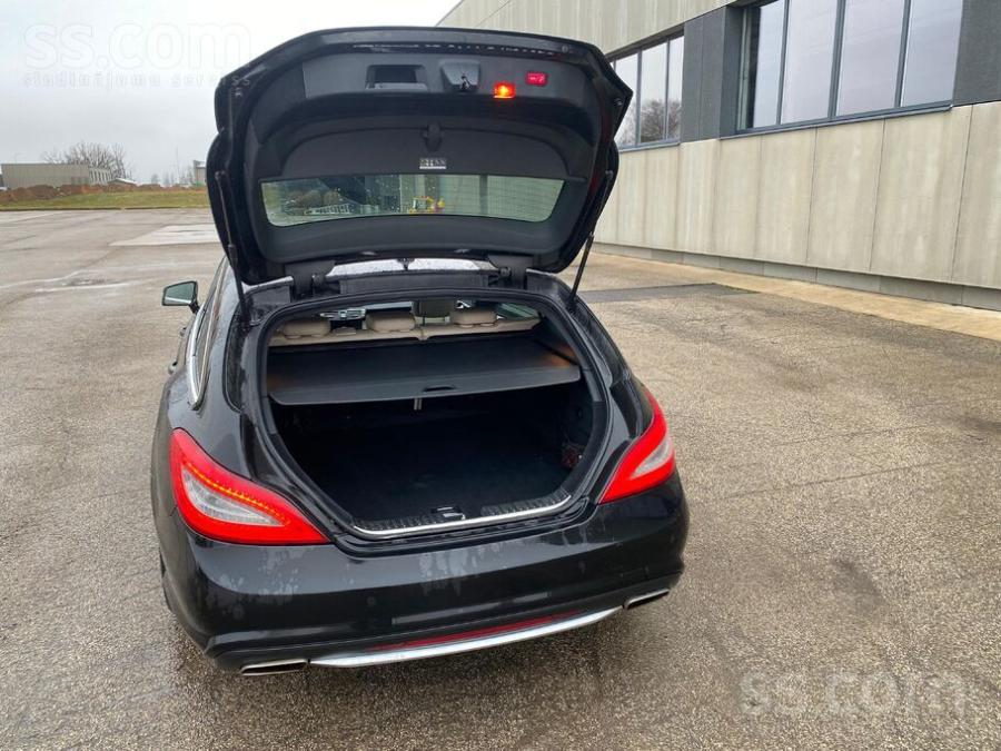 Black Mercedes-Benz CLS 350 2014 in Riga, with an engine capacity of 3.00 L and mileage of 297 thousand km for 13100 €, photo 6 on AUTOMOTO.COM.LV