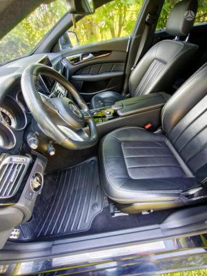 Black Mercedes-Benz CLS 350 2016 in Utena, with an engine capacity of 2.99 L and mileage of 237 thousand km for 13900 €, photo 14 on AUTOMOTO.COM.LV