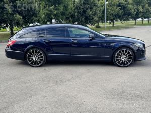 Blue Mercedes-Benz CLS 350 2014 in Riga, with an engine capacity of 3.00 L and mileage of 325 thousand km for 14990 €, photo 5 on AUTOMOTO.COM.LV