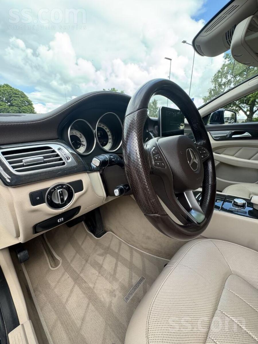 Blue Mercedes-Benz CLS 350 2014 in Riga, with an engine capacity of 3.00 L and mileage of 325 thousand km for 14990 €, photo 14 on AUTOMOTO.COM.LV