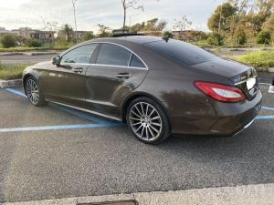 Brown Mercedes-Benz CLS 400 2015 in Riga, with an engine capacity of 3.60 L and mileage of 79 thousand km for 23900 €, photo 4 on AUTOMOTO.COM.LV