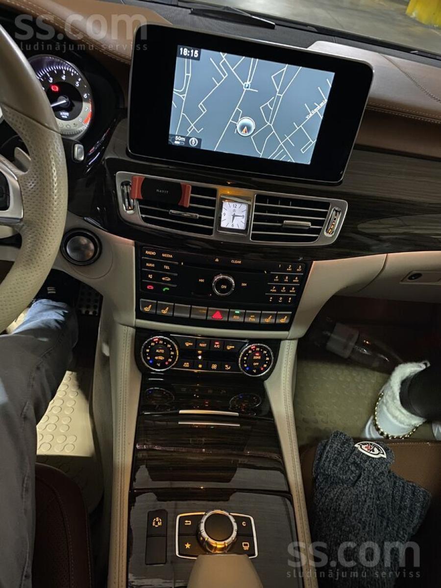 Brown Mercedes-Benz CLS 400 2015 in Riga, with an engine capacity of 3.60 L and mileage of 79 thousand km for 23900 €, photo 15 on AUTOMOTO.COM.LV