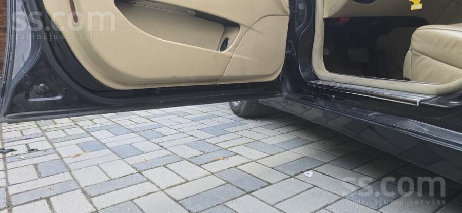 Melns Mercedes-Benz CLS 500 2005 Liepāja, ar dzinēja tilpumu 5.00 L un nobraukumu 337 tūkst. km par 6499 €, foto 15 vietnē AUTOMOTO.COM.LV