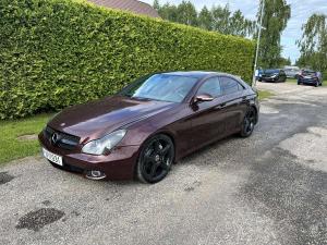Sarkans Mercedes-Benz cls-55-amg 2006 Tartu, ar dzinēja tilpumu 5.44 L un nobraukumu 218 tūkst. km par 18700 €, foto  vietnē AUTOMOTO.COM.LV