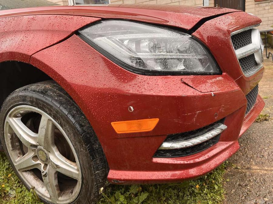 Red Mercedes-Benz CLS 550 2012 in Kaunas, with an engine capacity of 4.70 L and mileage of 223 thousand km for 6500 €, photo 8 on AUTOMOTO.COM.LV