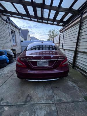 Red Mercedes-Benz CLS 550 2012 in Kaunas, with an engine capacity of 4.70 L and mileage of 223 thousand km for 6500 €, photo 15 on AUTOMOTO.COM.LV