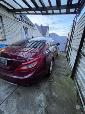 Red Mercedes-Benz CLS 550 2012 in Kaunas, with an engine capacity of 4.70 L and mileage of 223 thousand km for 6500 €, photo 16 on AUTOMOTO.COM.LV