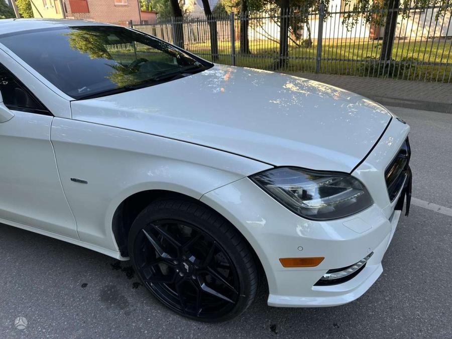 White Mercedes-Benz CLS 550 2012 in Jonava, with an engine capacity of 4.70 L and mileage of 196 thousand km for 12250 €, photo 7 on AUTOMOTO.COM.LV