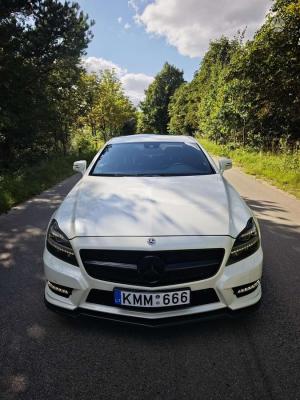 White Mercedes-Benz CLS 550 2013 in Plunge, with an engine capacity of 4.66 L and mileage of 263 thousand km for 21000 €, photo  on AUTOMOTO.COM.LV