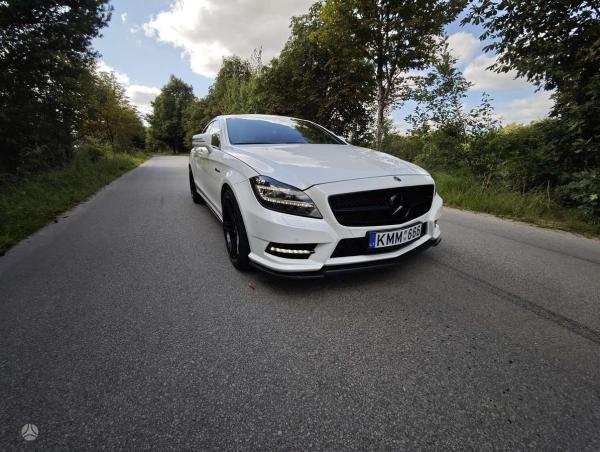 White Mercedes-Benz CLS 550 2013 in Plunge, with an engine capacity of 4.66 L and mileage of 263 thousand km for 21000 €, photo 4 on AUTOMOTO.COM.LV