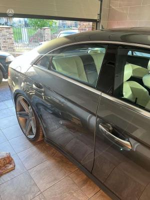 Brown Mercedes-Benz cls-63-amg 2007 in Kaunas, with an engine capacity of 6.21 L and mileage of 254 thousand km for 13300 €, photo 11 on AUTOMOTO.COM.LV