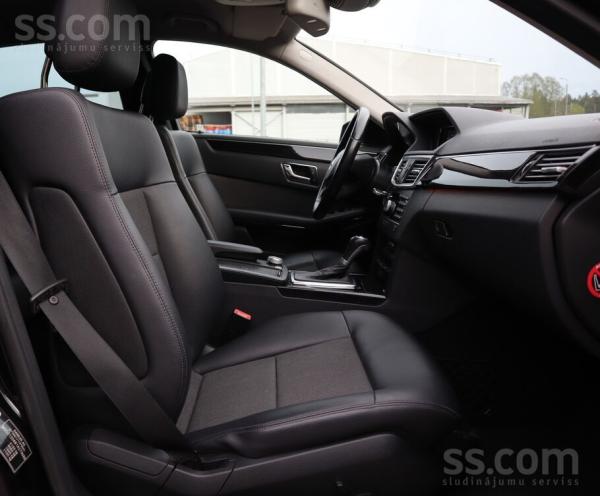 Black Mercedes-Benz e-200 2010 in Riga, with an engine capacity of 1.80 L and mileage of 243 thousand km for 6490 €, photo 10 on AUTOMOTO.COM.LV