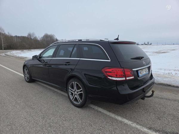 Black Mercedes-Benz e-200 2015 in Alytus, with an engine capacity of 2.10 L and mileage of 264 thousand km for 6999 €, photo 6 on AUTOMOTO.COM.LV