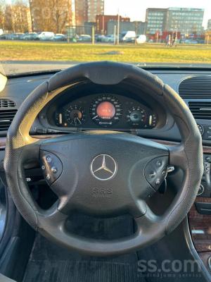 Blue Mercedes-Benz e-200 2004 in Riga, with an engine capacity of 1.80 L and mileage of 394 thousand km for 1100 €, photo 18 on AUTOMOTO.COM.LV
