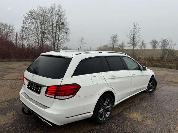 White Mercedes-Benz e-200 2015 in Kaunas, with an engine capacity of 2.14 L and mileage of 295 thousand km for 9399 €, photo 7 on AUTOMOTO.COM.LV