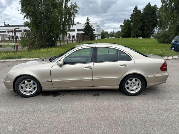 Yellow Mercedes-Benz e-200 2004 in Rokiskis, with an engine capacity of 2.15 L and mileage of 432 thousand km for 2500 €, photo 3 on AUTOMOTO.COM.LV