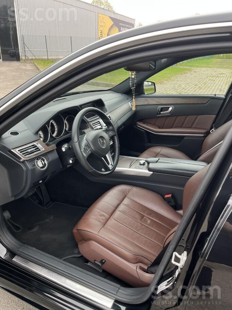 Black Mercedes-Benz E 220 2014 in Riga, with an engine capacity of 2.20 L and mileage of 223 thousand km for 18300 €, photo 7 on AUTOMOTO.COM.LV