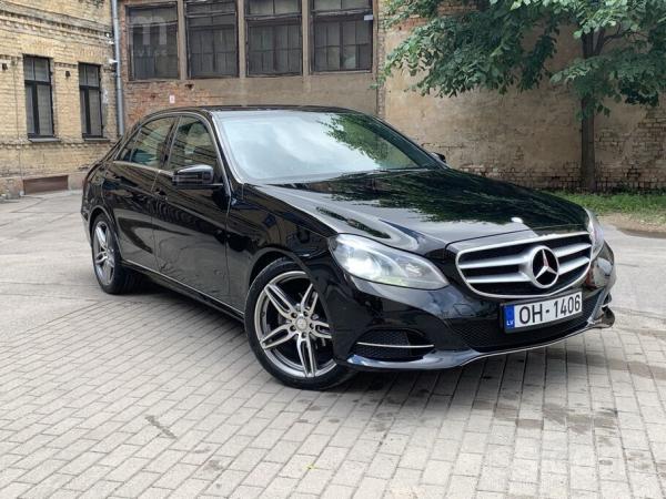 Black Mercedes-Benz E 220 2014 in Riga, with an engine capacity of 2.20 L and mileage of 247 thousand km for 16600 €, photo 1 on AUTOMOTO.COM.LV