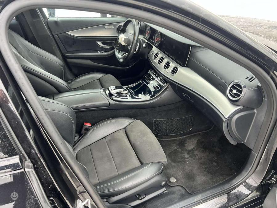 Black Mercedes-Benz E 220 2018 in Kaunas, with an engine capacity of 1.95 L and mileage of 325 thousand km for 11300 €, photo 14 on AUTOMOTO.COM.LV