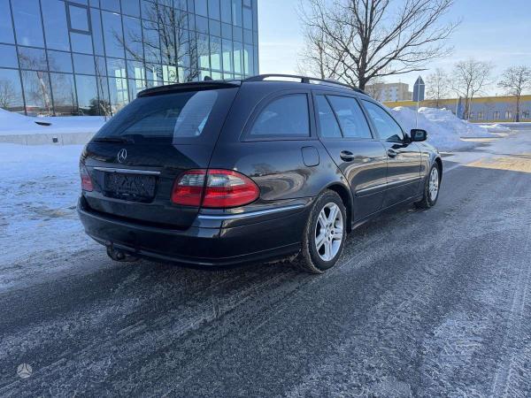 Black Mercedes-Benz E 220 2009 in Panevezys, with an engine capacity of 2.15 L and mileage of 487 thousand km for 2500 €, photo 4 on AUTOMOTO.COM.LV