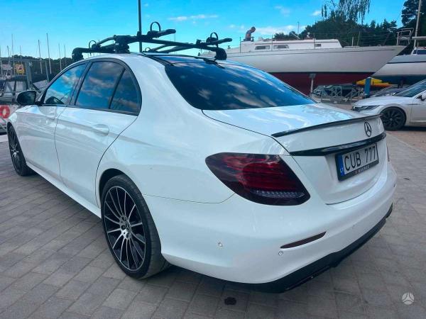 White Mercedes-Benz E 220 2019 in Kaunas, with an engine capacity of 1.95 L and mileage of 232 thousand km for 22400 €, photo 6 on AUTOMOTO.COM.LV