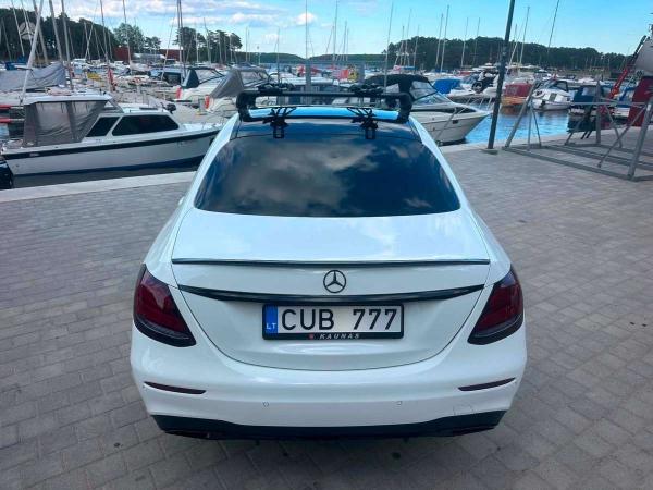 White Mercedes-Benz E 220 2019 in Kaunas, with an engine capacity of 1.95 L and mileage of 232 thousand km for 22400 €, photo 7 on AUTOMOTO.COM.LV