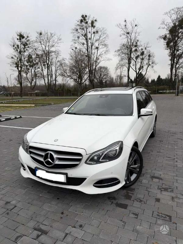 White Mercedes-Benz E 220 2015 in Kaunas, with an engine capacity of 2.14 L and mileage of 295 thousand km for 9399 €, photo 1 on AUTOMOTO.COM.LV
