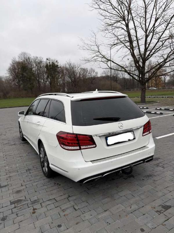 White Mercedes-Benz E 220 2015 in Kaunas, with an engine capacity of 2.14 L and mileage of 295 thousand km for 9399 €, photo 8 on AUTOMOTO.COM.LV