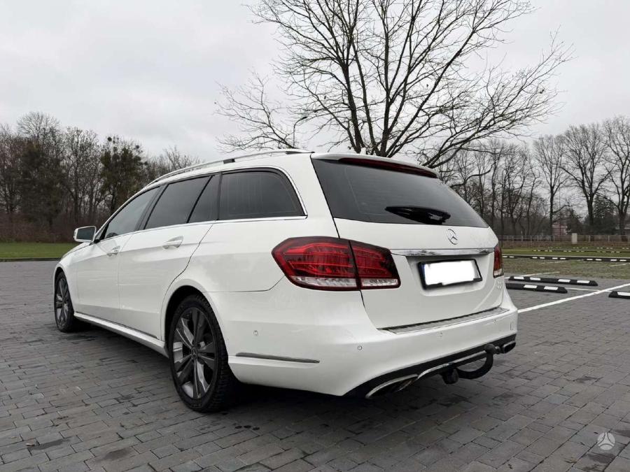 White Mercedes-Benz E 220 2015 in Kaunas, with an engine capacity of 2.14 L and mileage of 295 thousand km for 9399 €, photo 14 on AUTOMOTO.COM.LV
