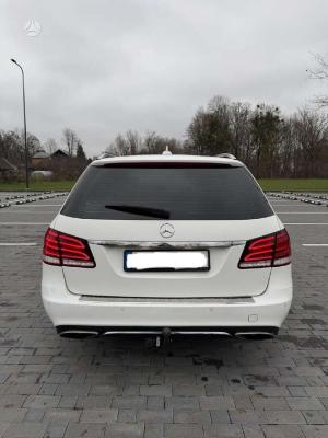 White Mercedes-Benz E 220 2015 in Kaunas, with an engine capacity of 2.14 L and mileage of 295 thousand km for 9399 €, photo 16 on AUTOMOTO.COM.LV