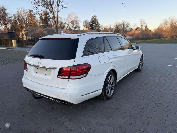 White Mercedes-Benz E 220 2015 in Kaunas, with an engine capacity of 2.14 L and mileage of 295 thousand km for 9999 €, photo 5 on AUTOMOTO.COM.LV