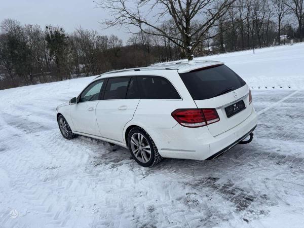 White Mercedes-Benz E 220 2015 in Kaunas, with an engine capacity of 2.14 L and mileage of 285 thousand km for 9899 €, photo 8 on AUTOMOTO.COM.LV