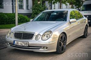 Pelēks Mercedes-Benz E 270 2004 Rīga, ar dzinēja tilpumu 2.70 L un nobraukumu 0 tūkst. km par 1990 €, foto  vietnē AUTOMOTO.COM.LV