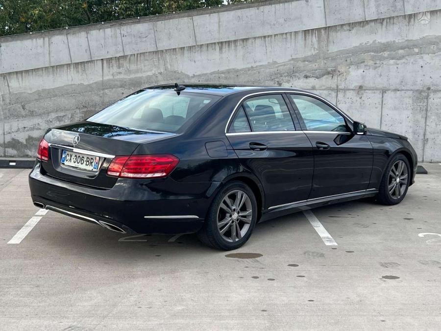 Black Mercedes-Benz E 300 2013 in Kaunas, with an engine capacity of 2.14 L and mileage of 245 thousand km for 7700 €, photo 7 on AUTOMOTO.COM.LV