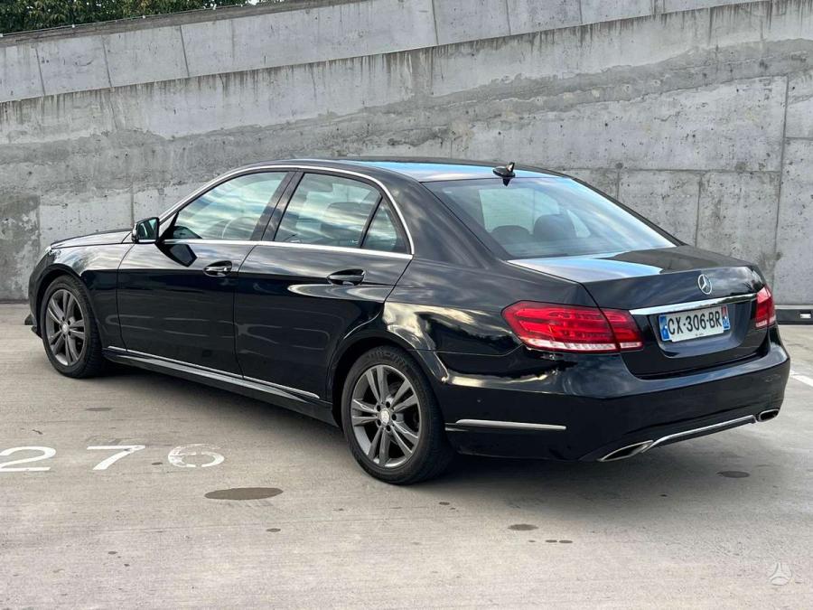 Black Mercedes-Benz E 300 2013 in Kaunas, with an engine capacity of 2.14 L and mileage of 245 thousand km for 7700 €, photo 31 on AUTOMOTO.COM.LV