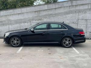 Black Mercedes-Benz E 300 2013 in Kaunas, with an engine capacity of 2.14 L and mileage of 245 thousand km for 7700 €, photo 35 on AUTOMOTO.COM.LV