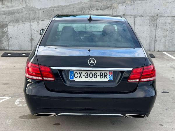 Black Mercedes-Benz E 300 2013 in Vilnius, with an engine capacity of 2.14 L and mileage of 245 thousand km for 6950 €, photo 5 on AUTOMOTO.COM.LV