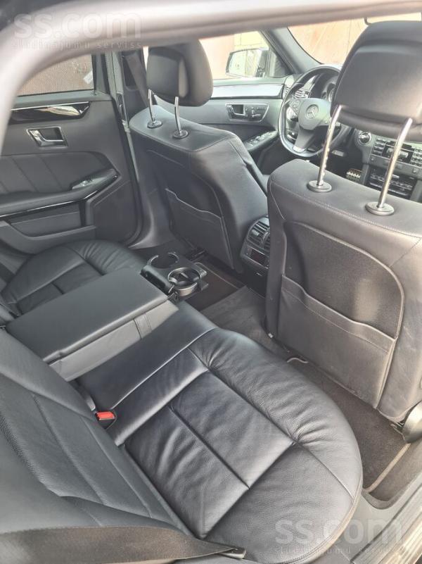 Black Mercedes-Benz E 300 2011 in Riga, with an engine capacity of 3.00 L and mileage of 220 thousand km for 10390 €, photo 8 on AUTOMOTO.COM.LV